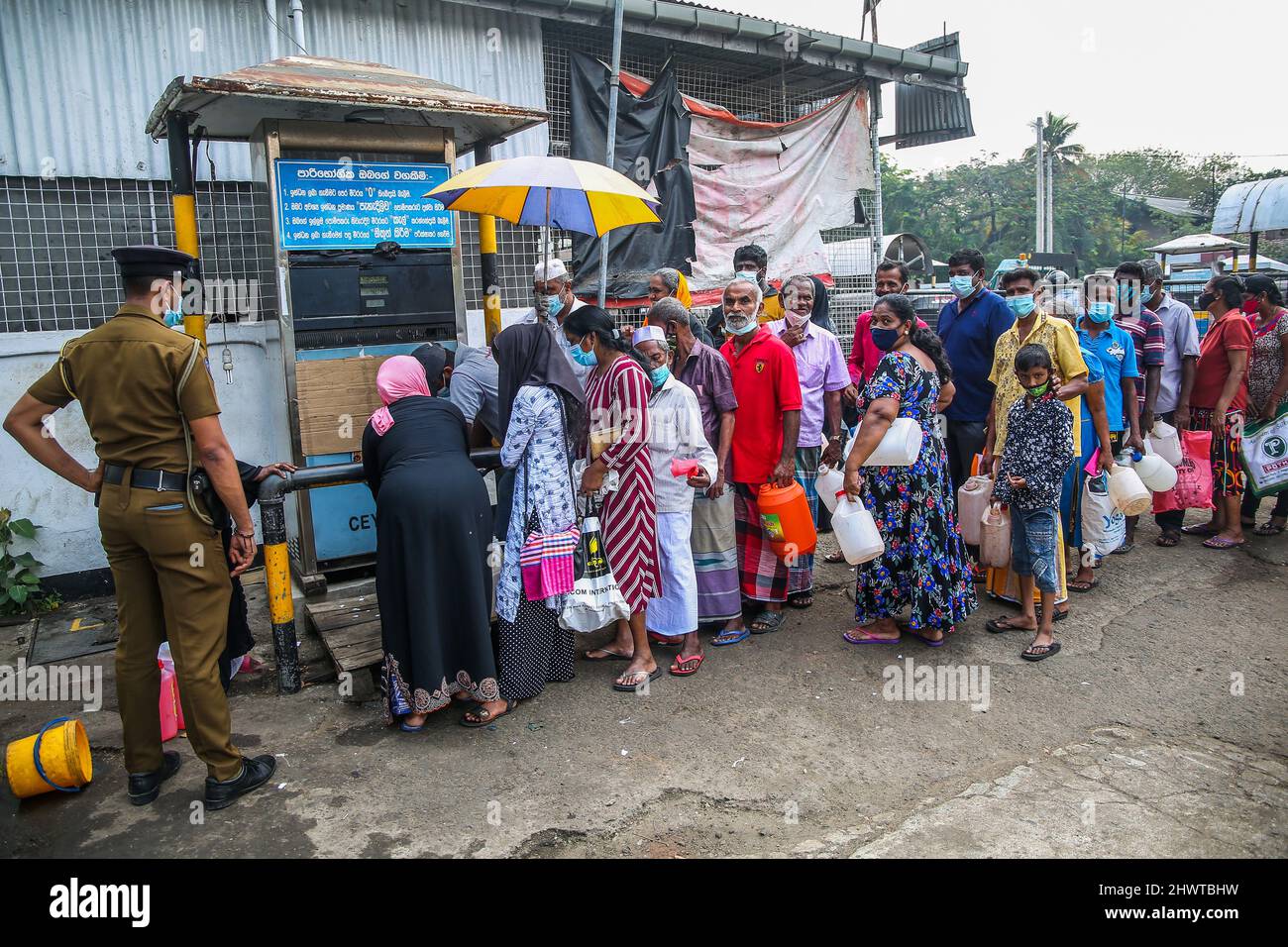 March 7, 2022, colombo, western, Sri Lanka: People stand in a queue to ...