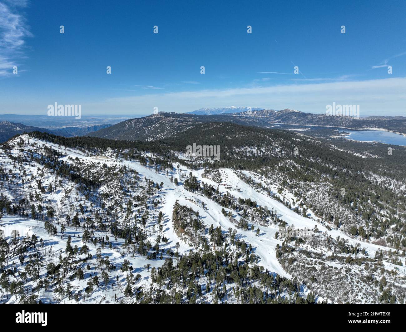 Aerial view of mountain ski resort with beautiful winter landscape in ...