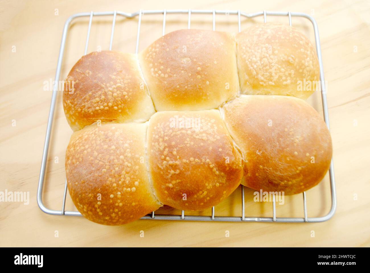 Cooling Baked Rolls Fresh from the Oven Stock Photo - Alamy