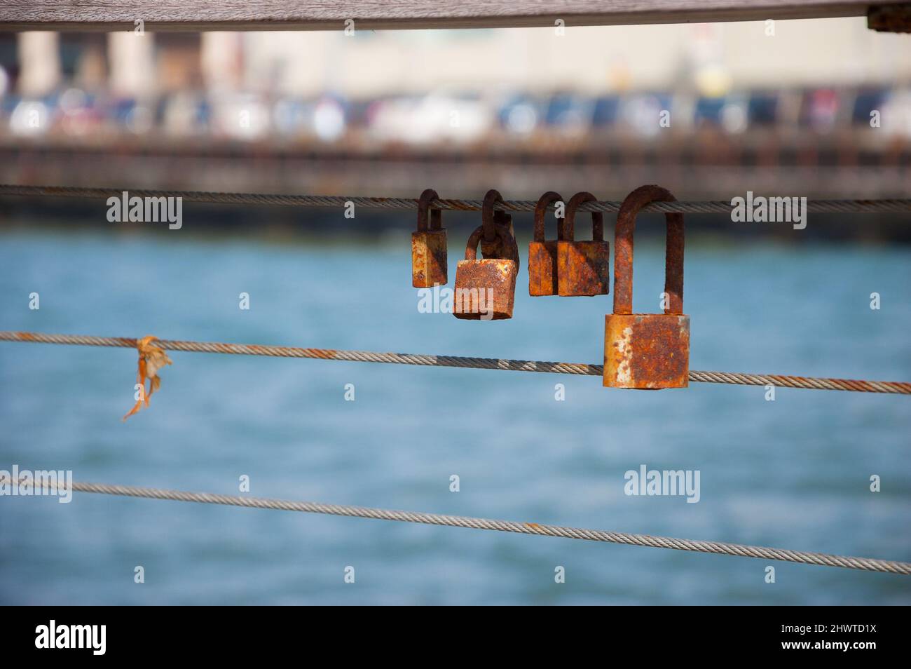 Rusty Love locks attached to railing in Tel Aviv port, Israel. Old love ...