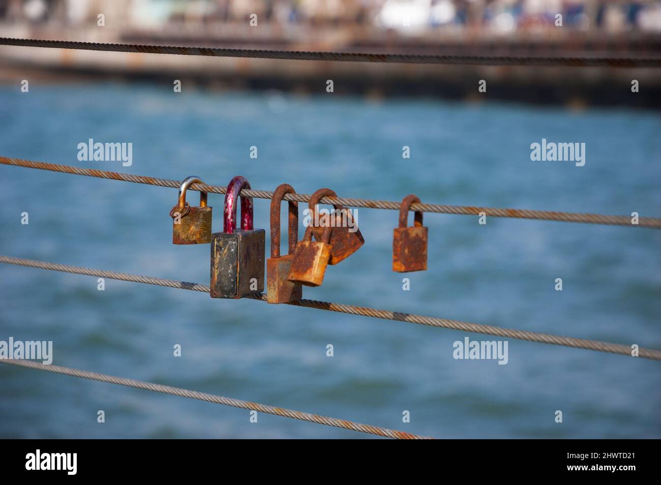 Rusty Love locks attached to railing in Tel Aviv port, Israel. Old love ...