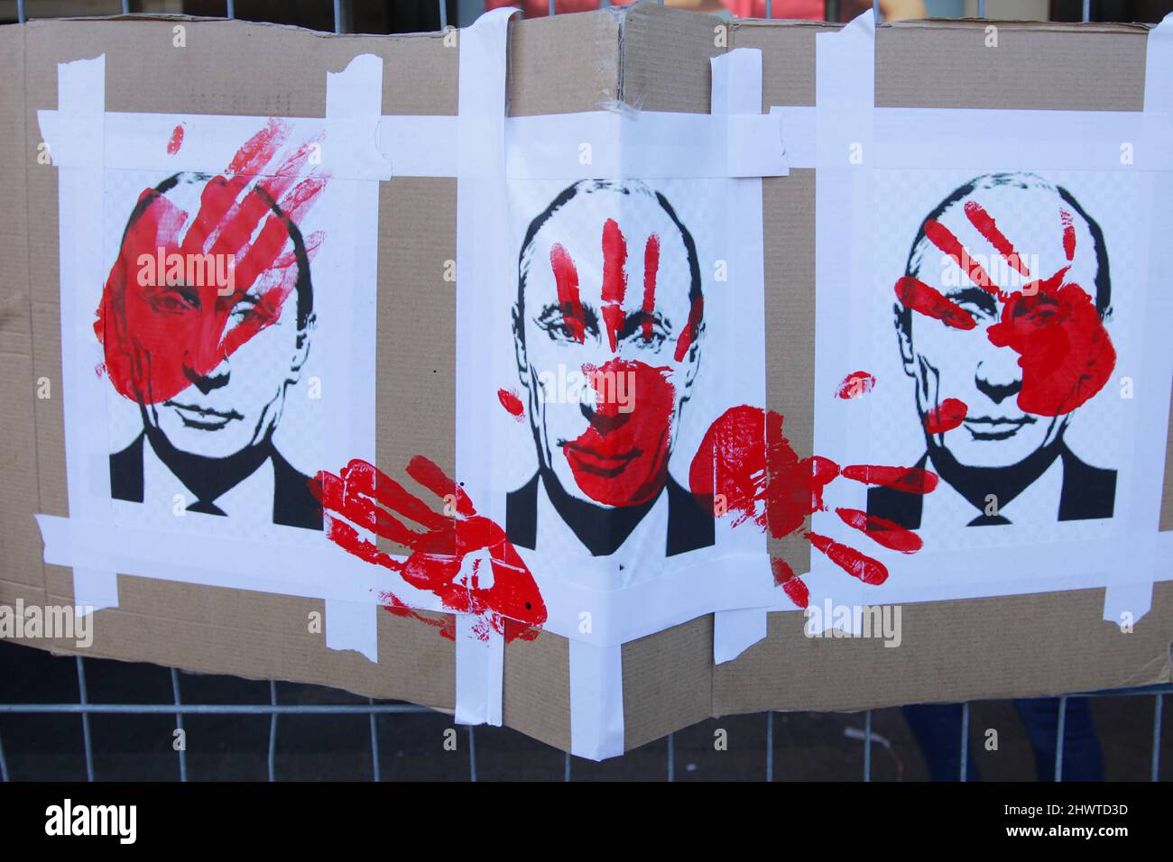 Placards showing pictures of Russian president Vladimir Putin with a ...