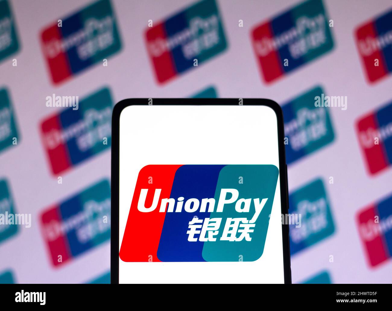 In this photo illustration, the UnionPay (CUP) logo seen displayed on a ...