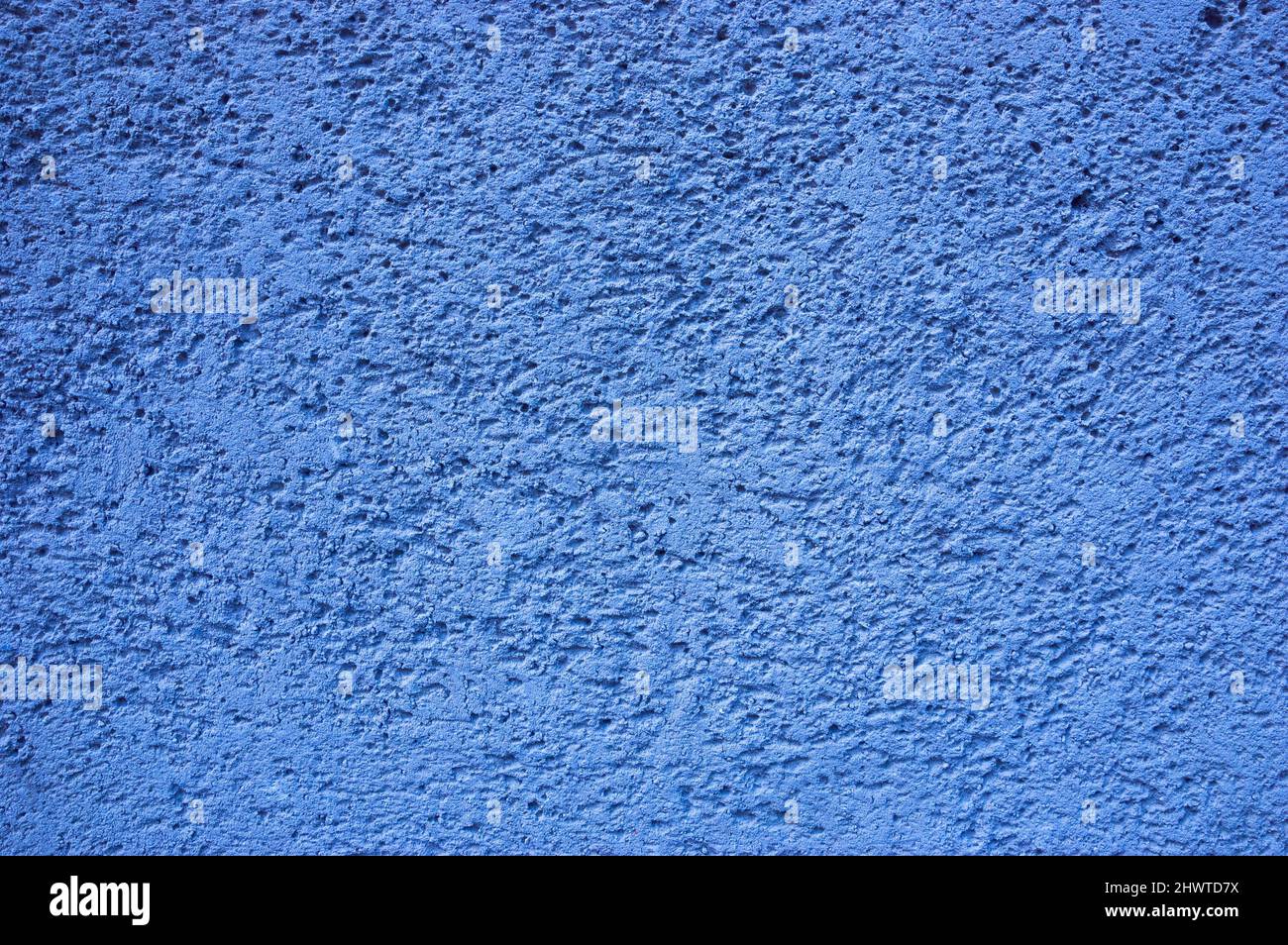 Blue painted sandstone wall Stock Photo - Alamy