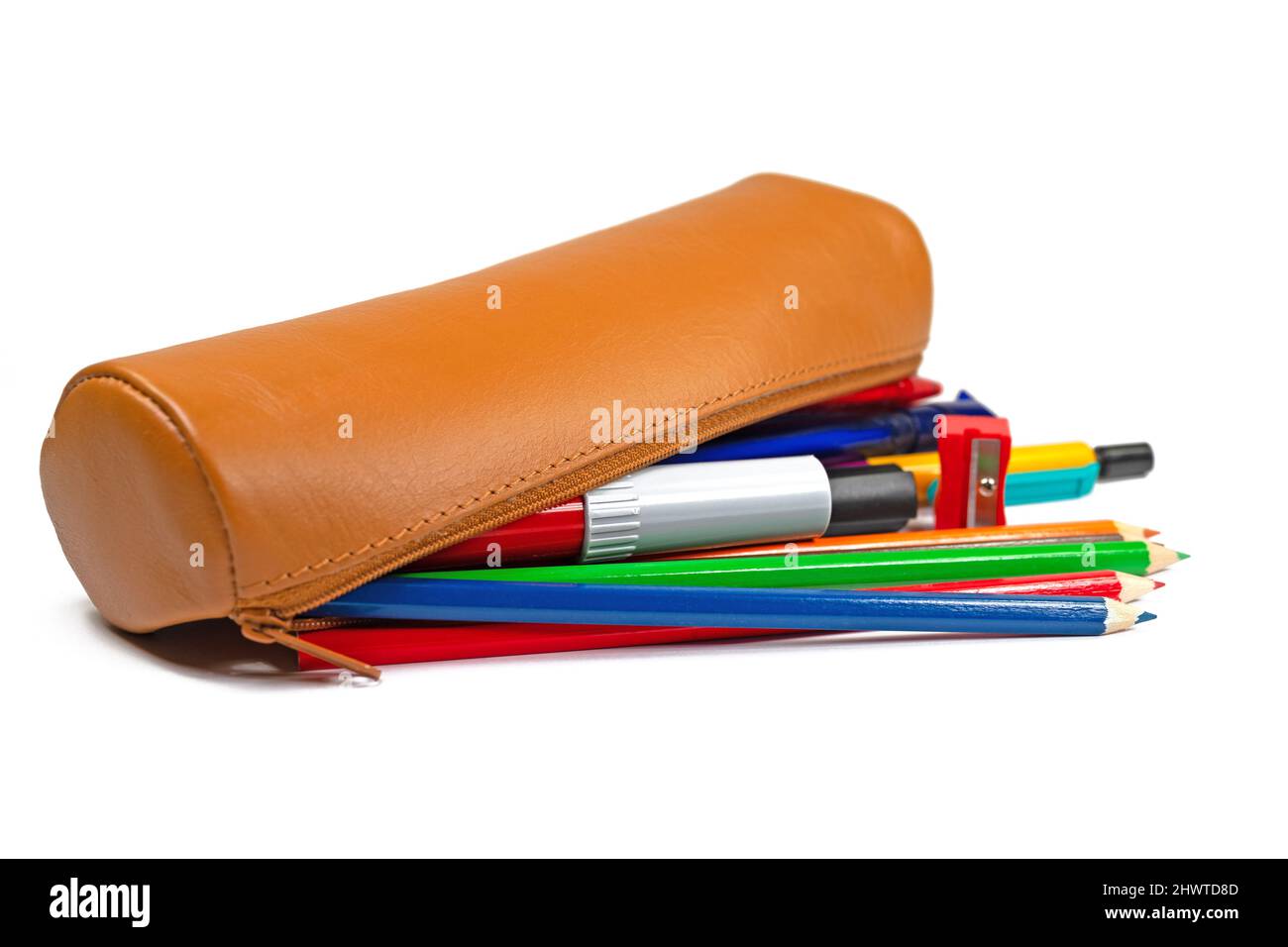 Filled pencil case against white background Stock Photo - Alamy