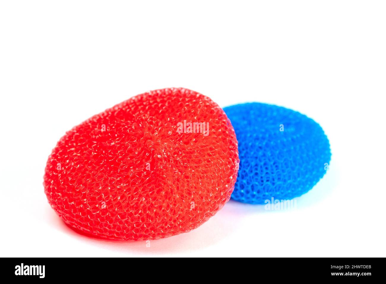 Colorful plastic scourers against a white background Stock Photo - Alamy