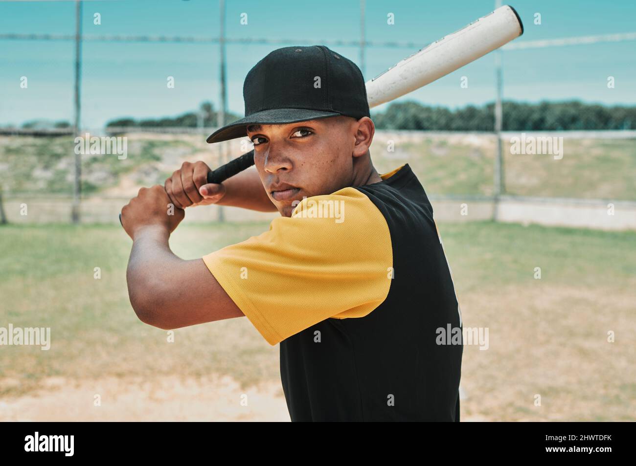Its time to hit hard and run fast. Shot of a young baseball player ...