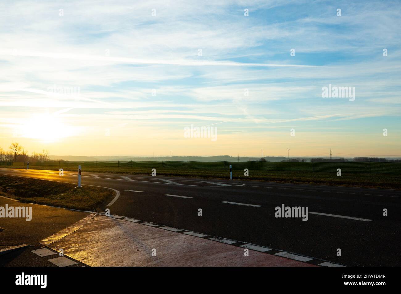 Sunrise wind energy pinwheel hi-res stock photography and images - Alamy