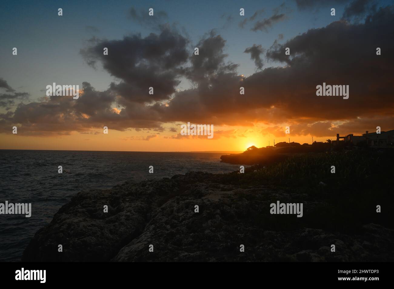 Amazing sunset on atlantic ocean shore. Rocky bay in aquatic sundown ...