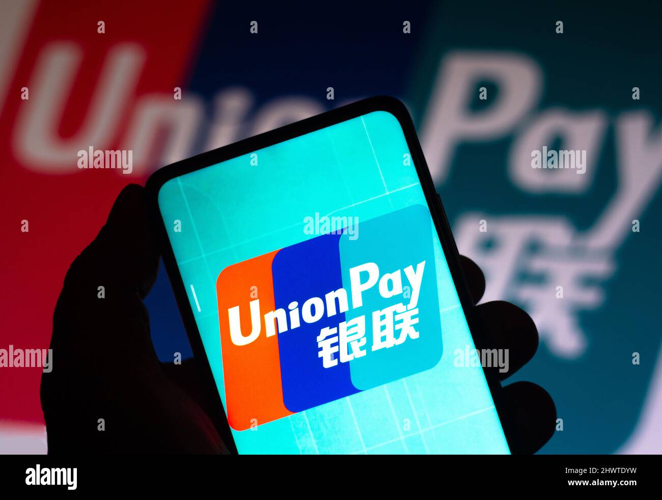 In this photo illustration, the UnionPay (CUP) logo seen displayed on a ...