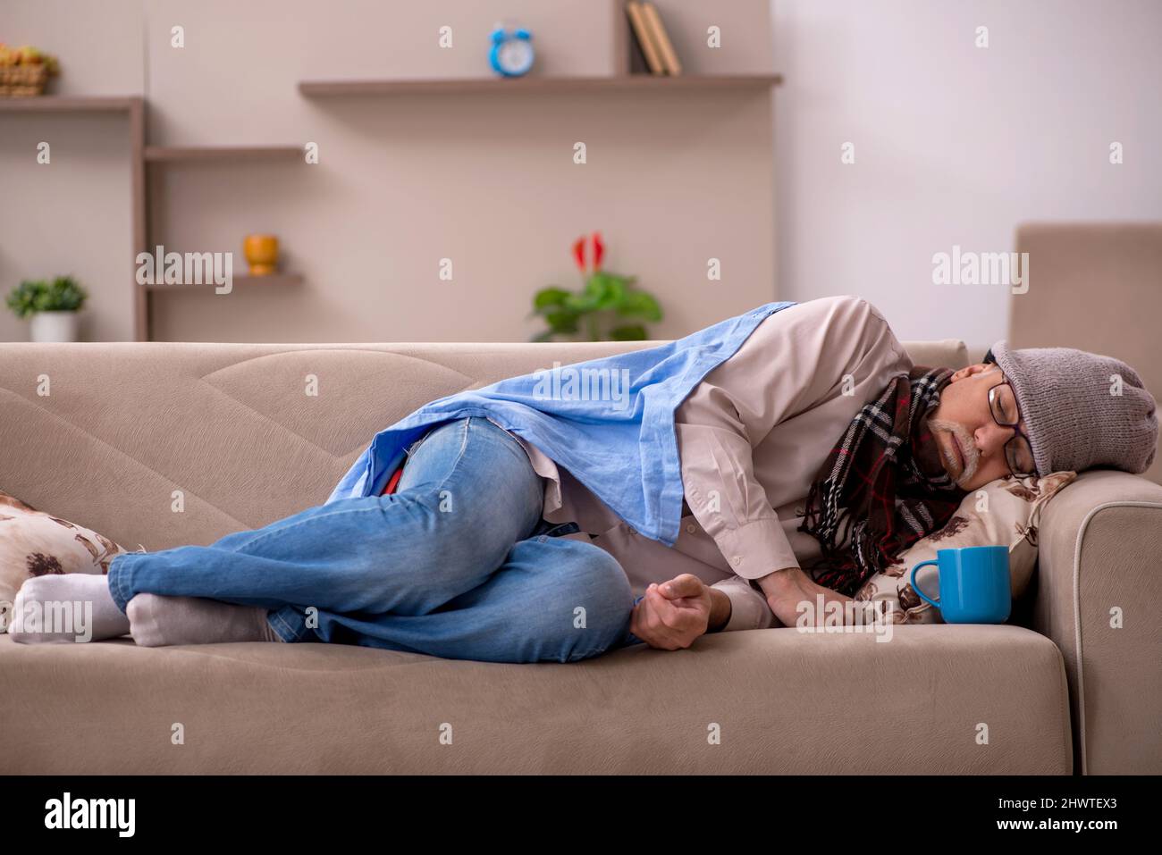 Sick old man coughing lying hi-res stock photography and images - Alamy