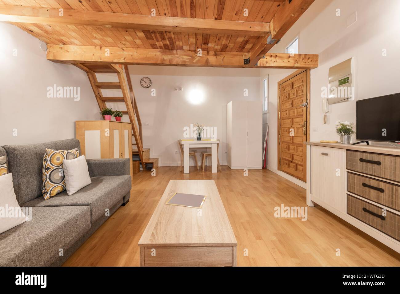 Duplex loft with wooden structure to support the upstairs bedroom and ...