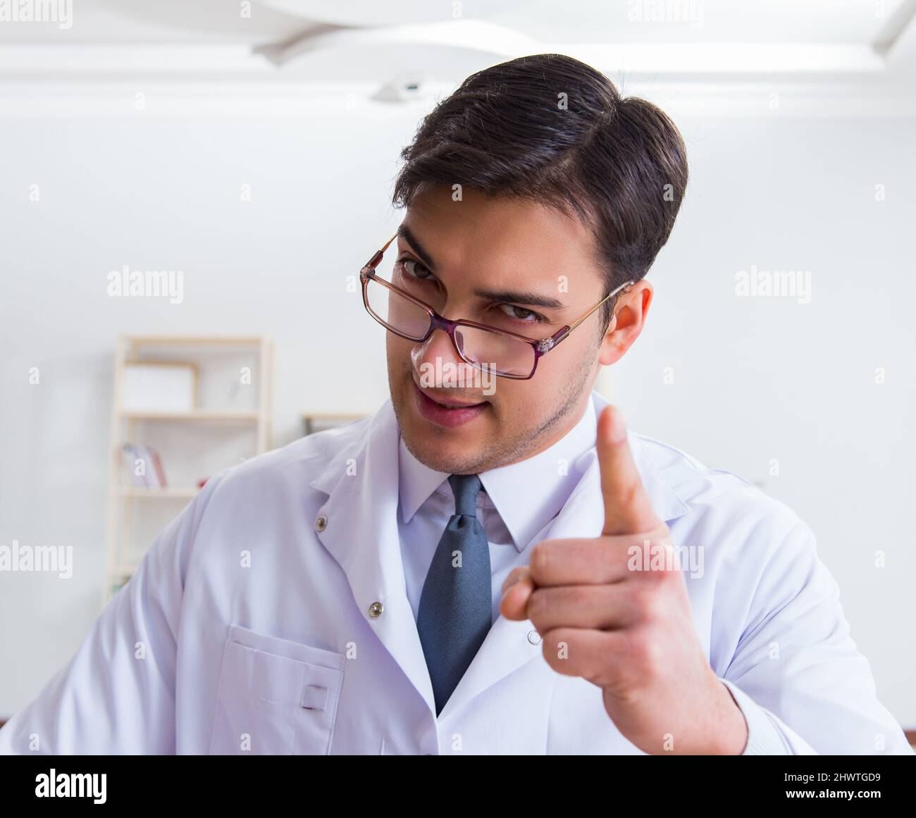 Angry pointing doctor young man hi-res stock photography and images - Alamy