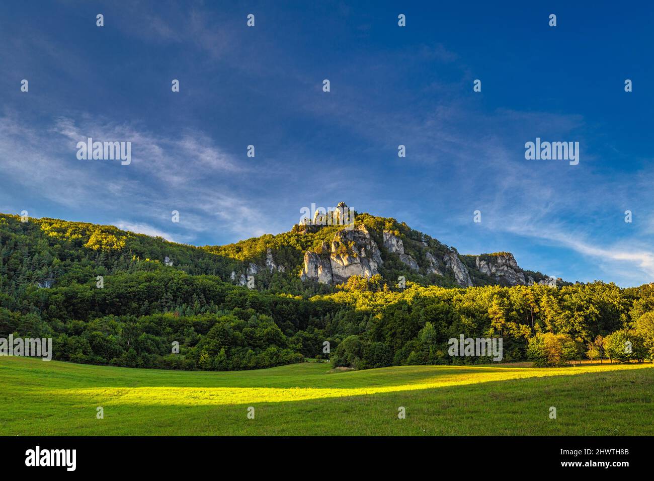 Mountain landscape with rocky peaks on background at sunset in summer ...