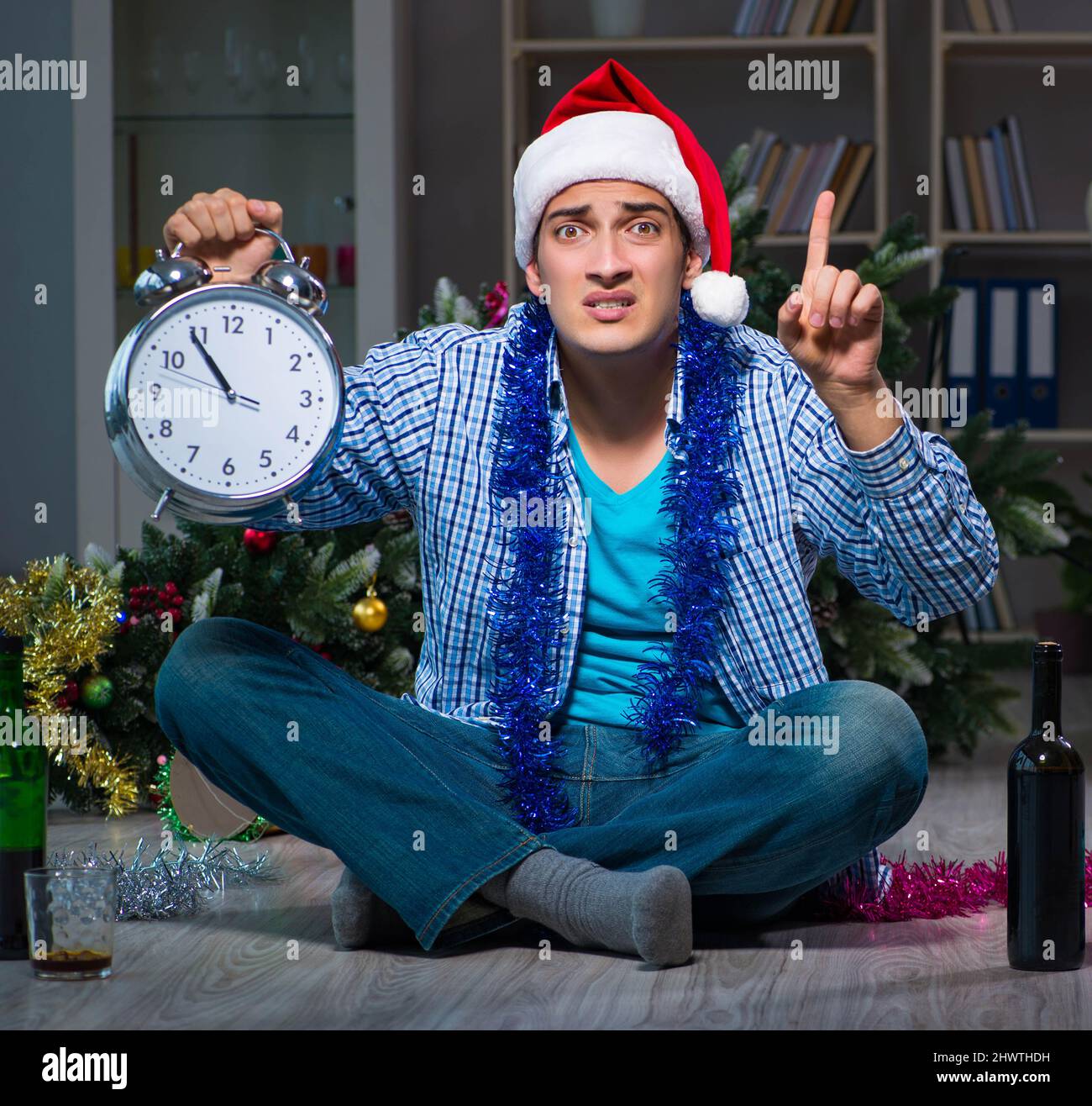 The man celebrating christmas at home alone Stock Photo - Alamy