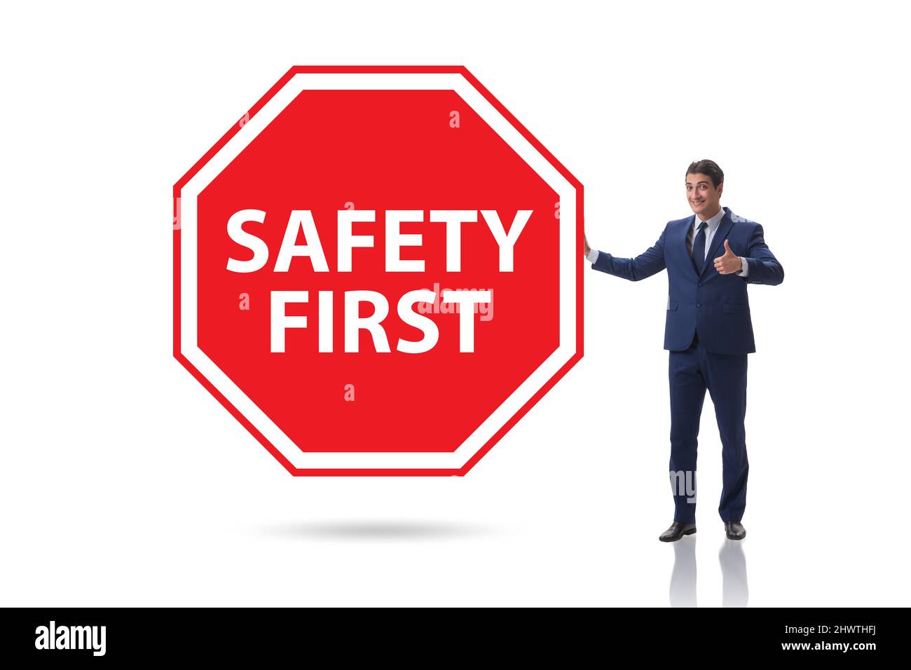 Safety first concept with the businessman Stock Photo - Alamy