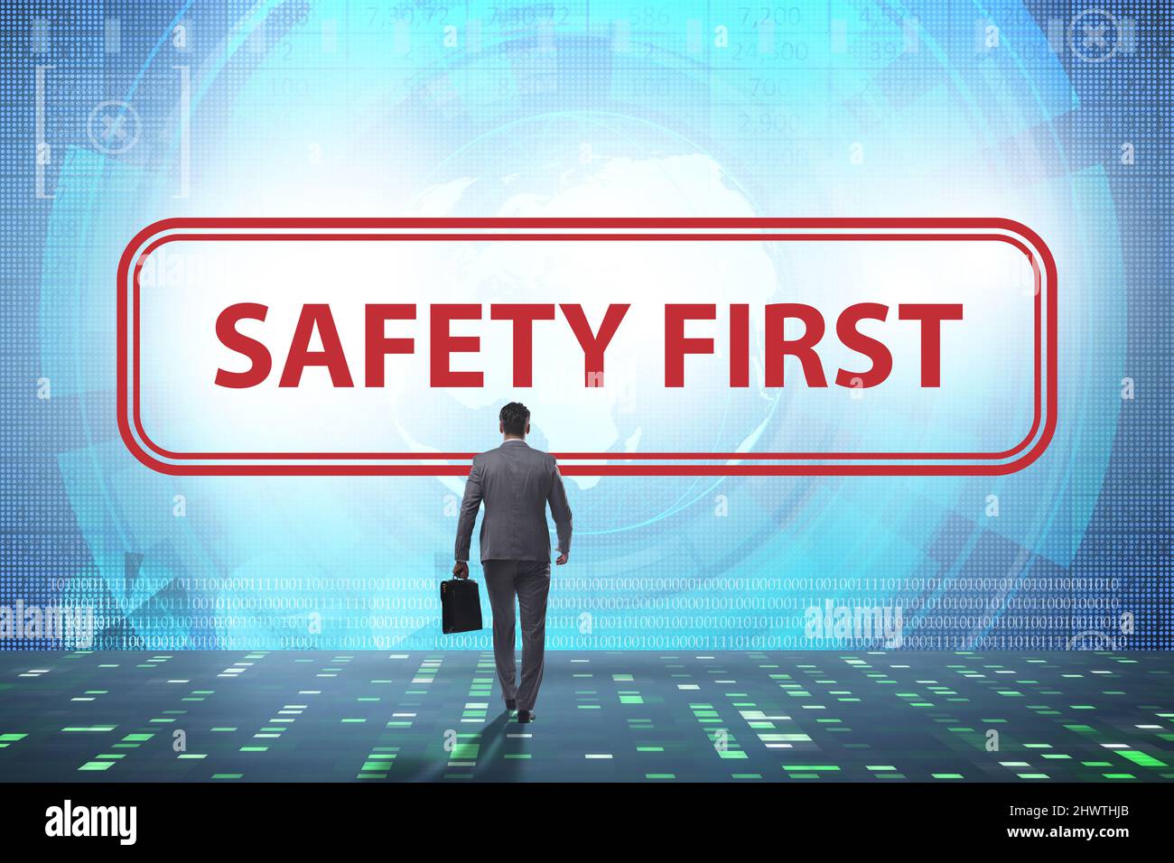 Safety first badge with the business people Stock Photo - Alamy