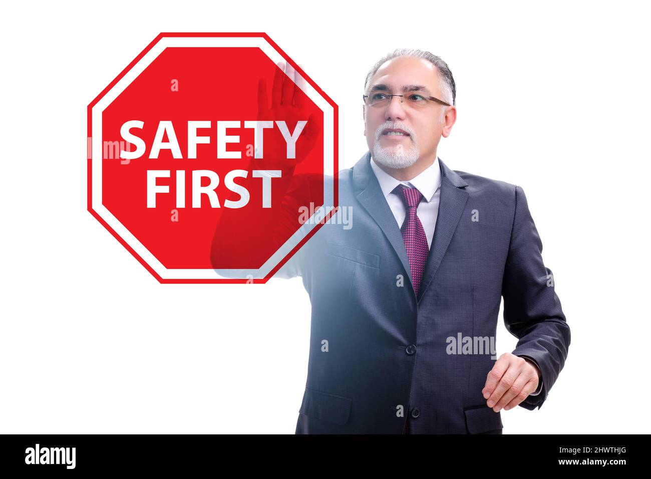 Safety first concept with the businessman Stock Photo - Alamy