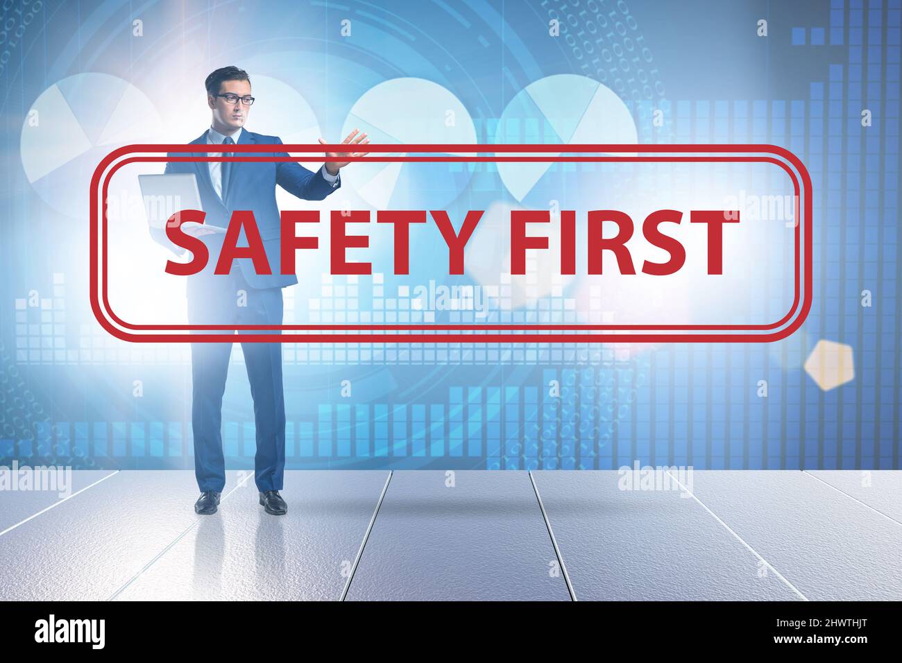 Safety first concept with the businessman Stock Photo - Alamy