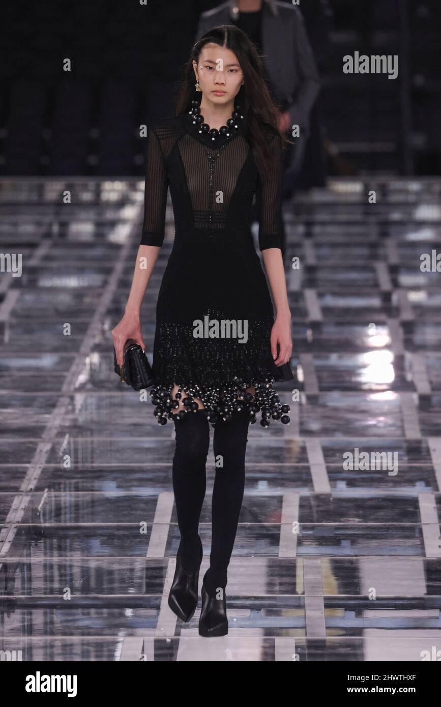 In this photo model Sherry Shi walks on runway of a fashion show in ...