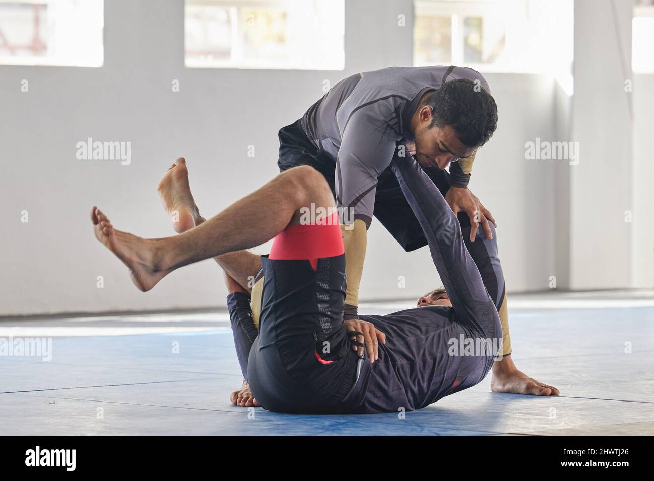Theres a move for every scenario. Full length shot of a jiu jitsu ...