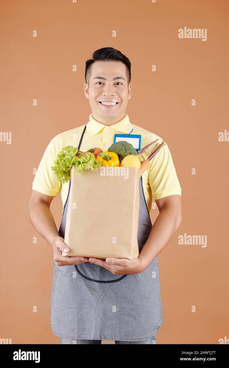 Supermarket worker full portrait hi-res stock photography and images ...