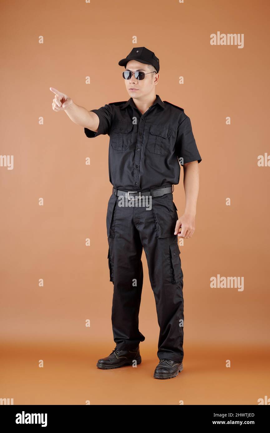 Police officer pointing finger hi-res stock photography and images - Alamy