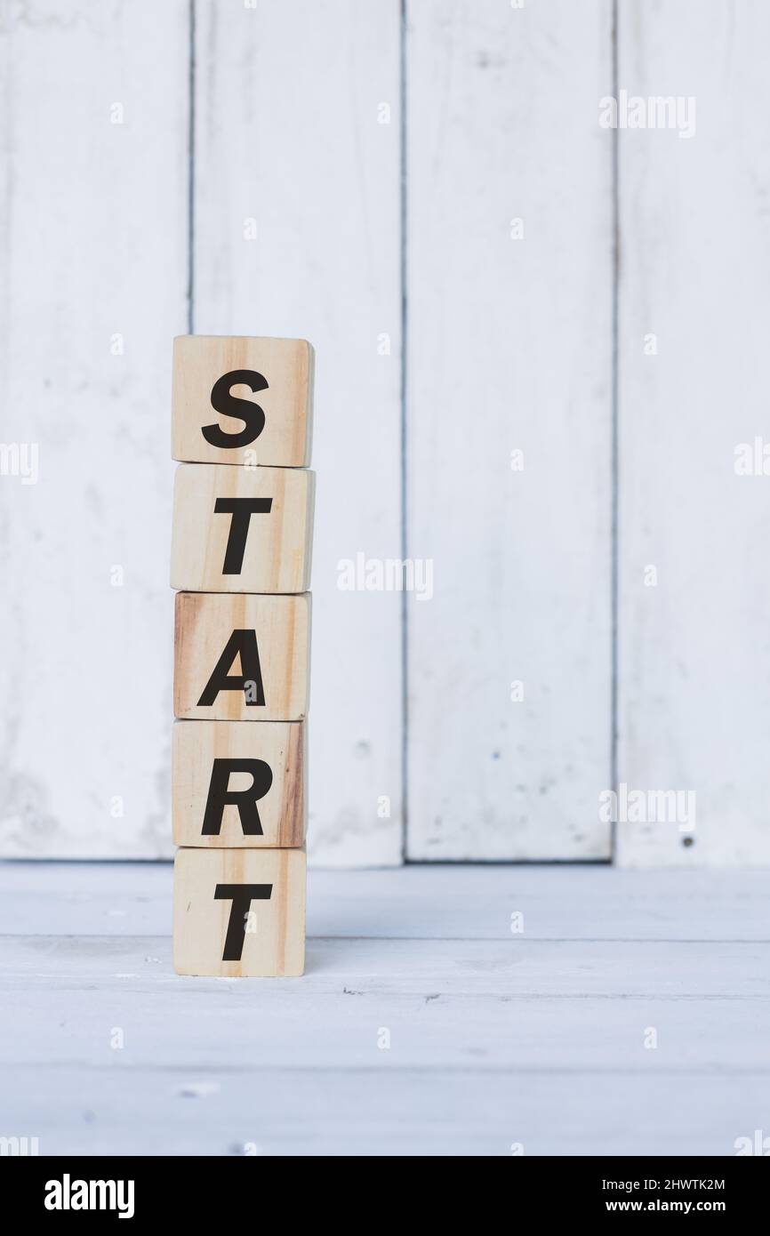 start word or concept on wooden blocks, white wood background Stock ...