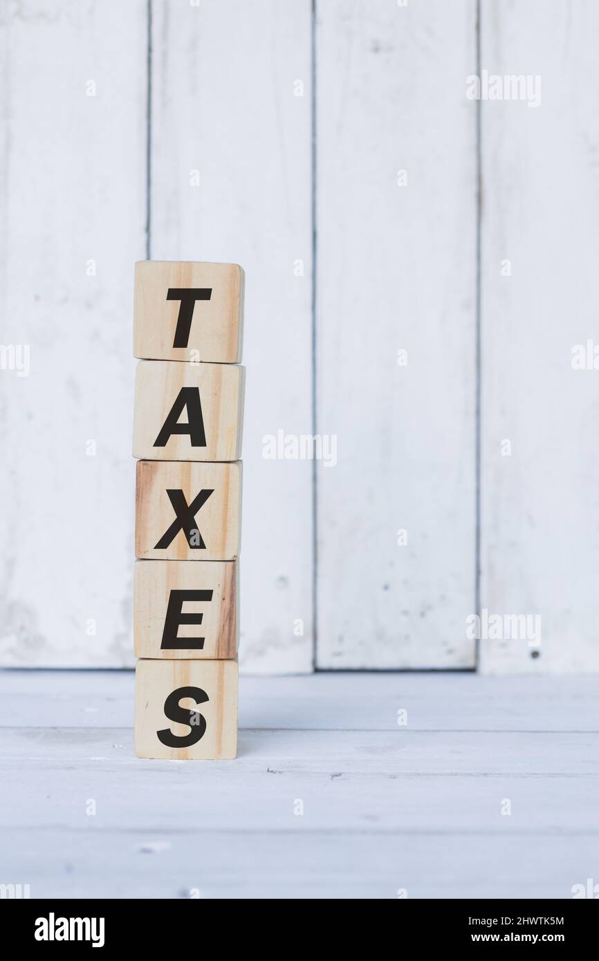 taxes word or concept on wooden blocks, white wood background Stock ...