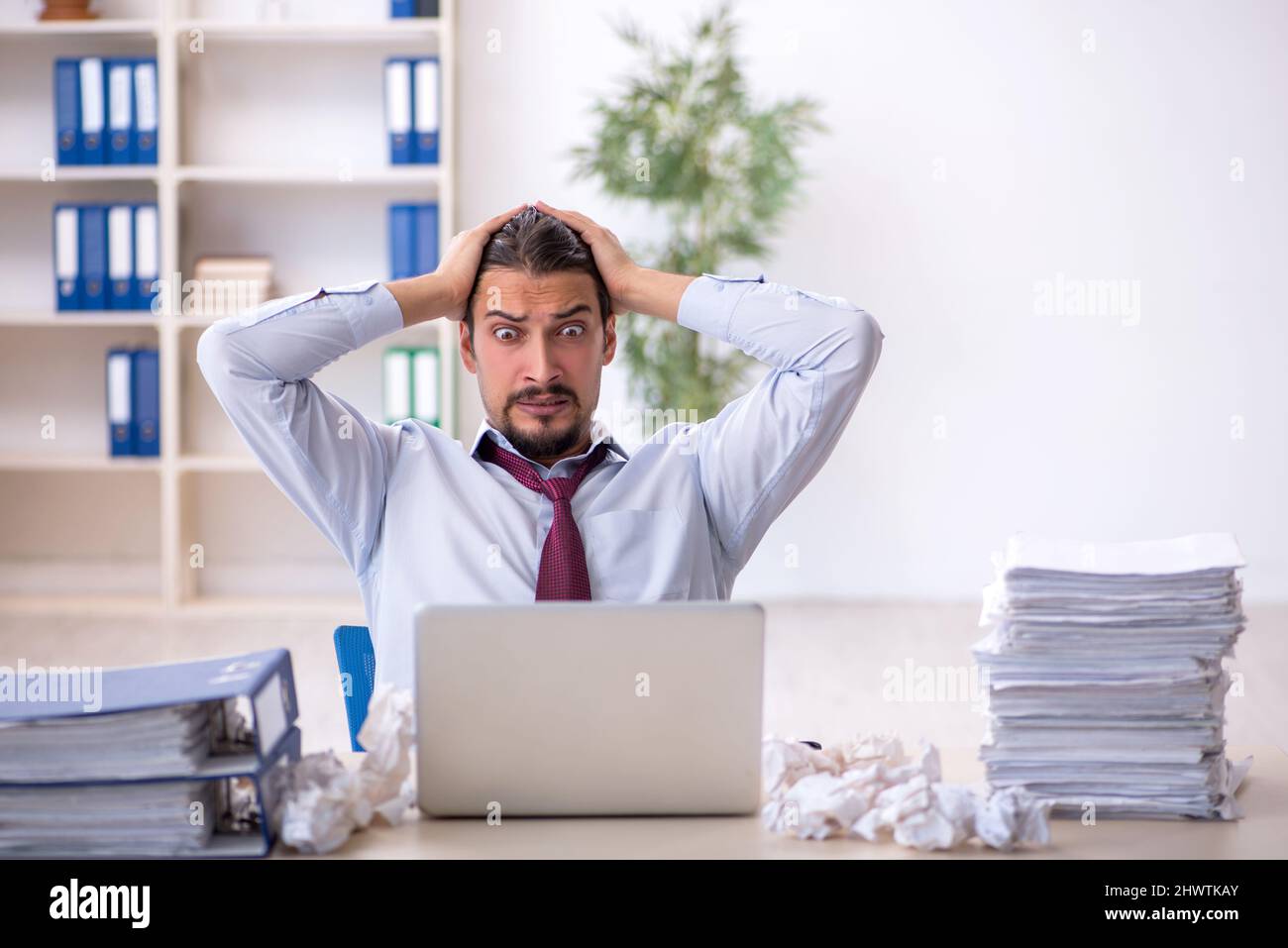 Young businessman employee in rejected ideas concept Stock Photo - Alamy
