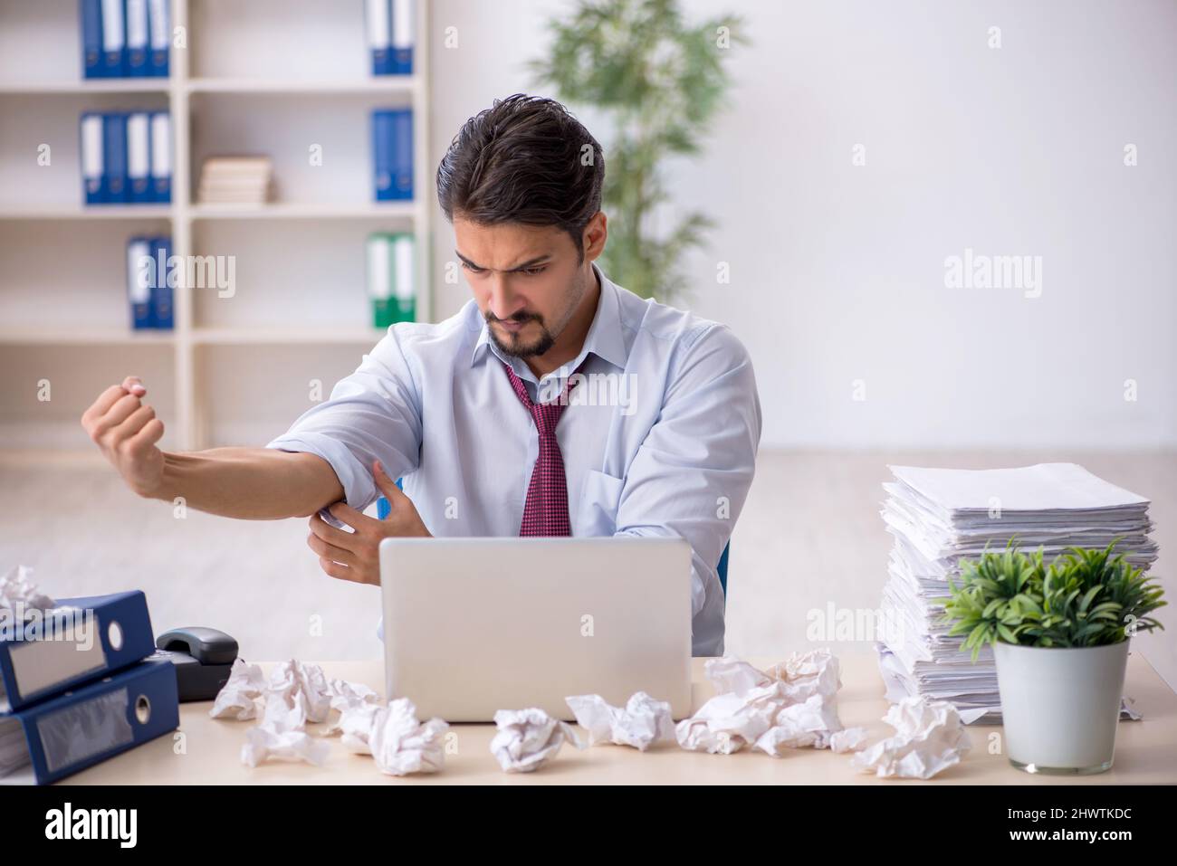 Young businessman employee in rejected ideas concept Stock Photo - Alamy