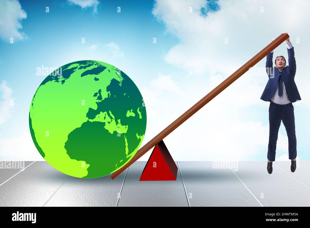 Businessman lifting the earth in the challenge concept Stock Photo - Alamy