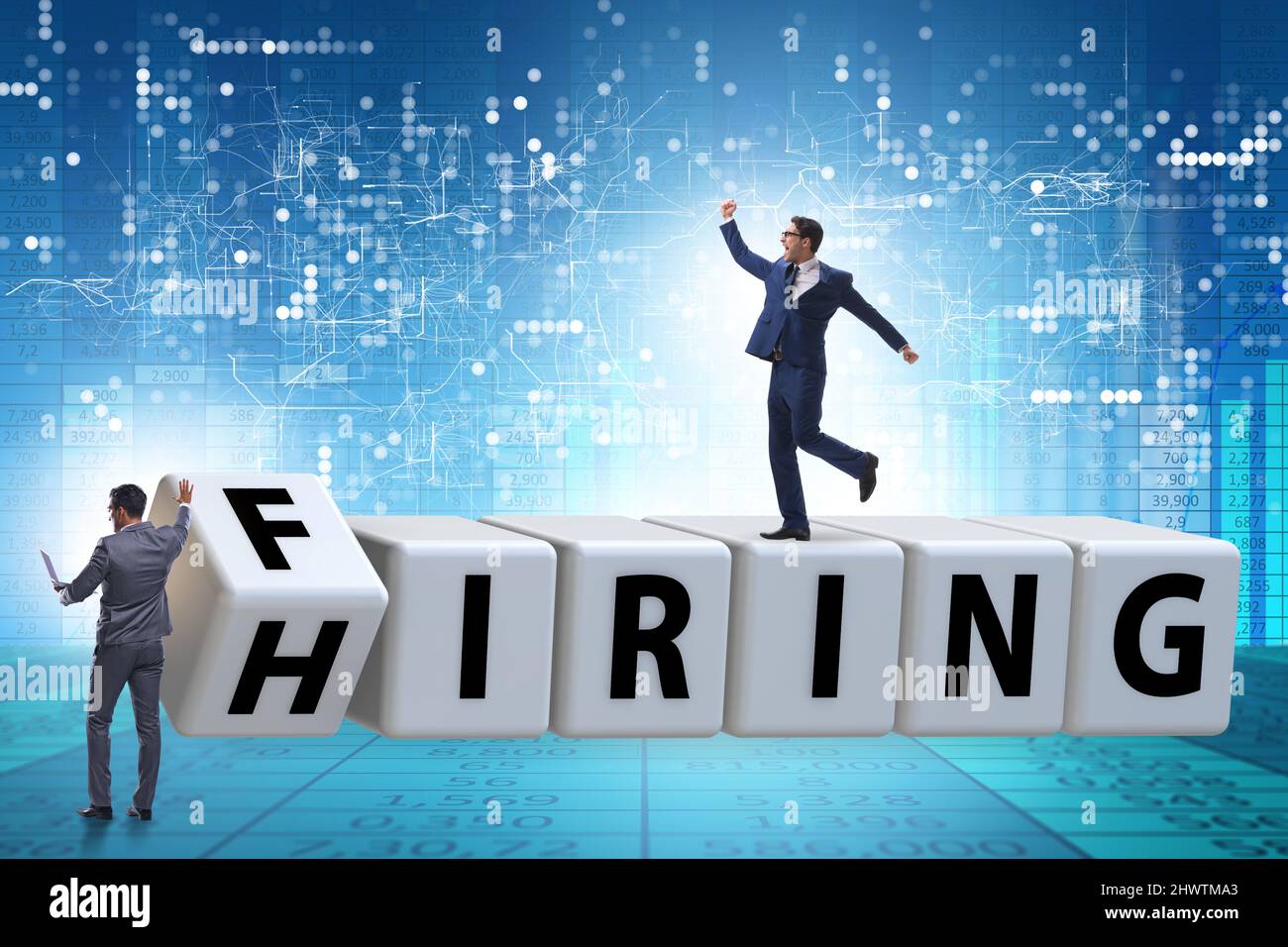 Hiring and firing concept with the turning cubes Stock Photo - Alamy
