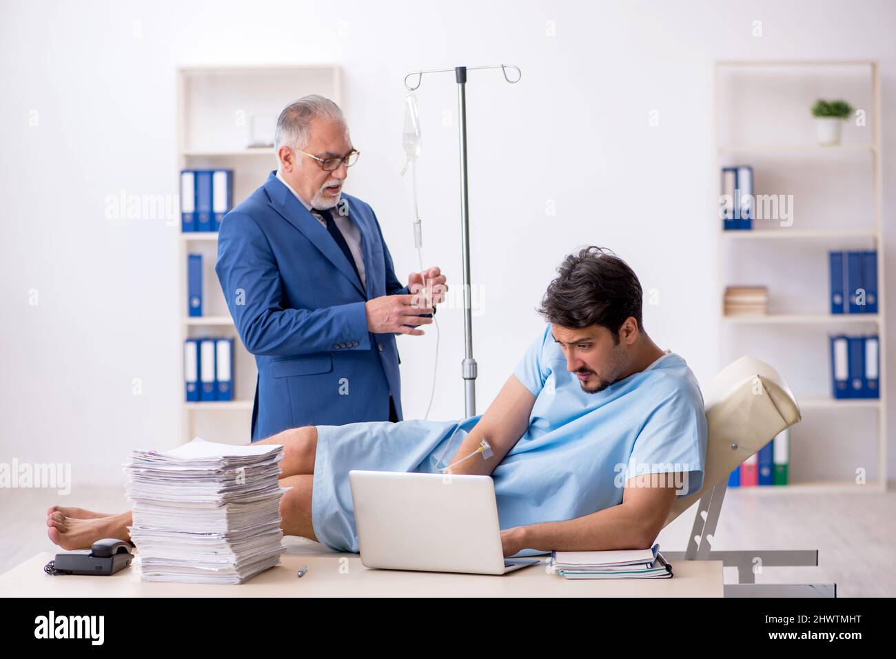 Young employee feeling bad at workplace Stock Photo - Alamy