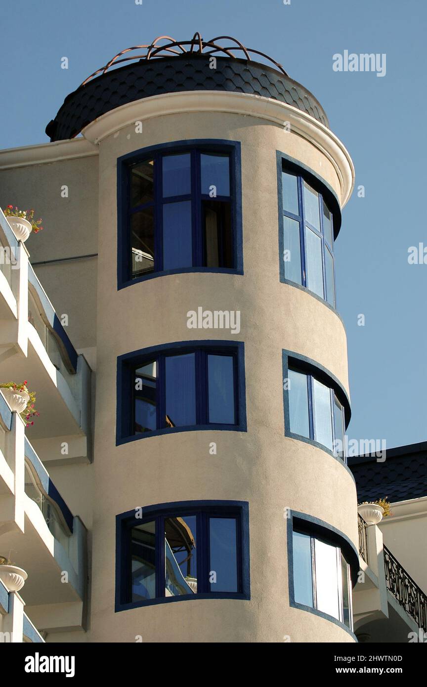 Hotel windows and blue sky Stock Photo - Alamy