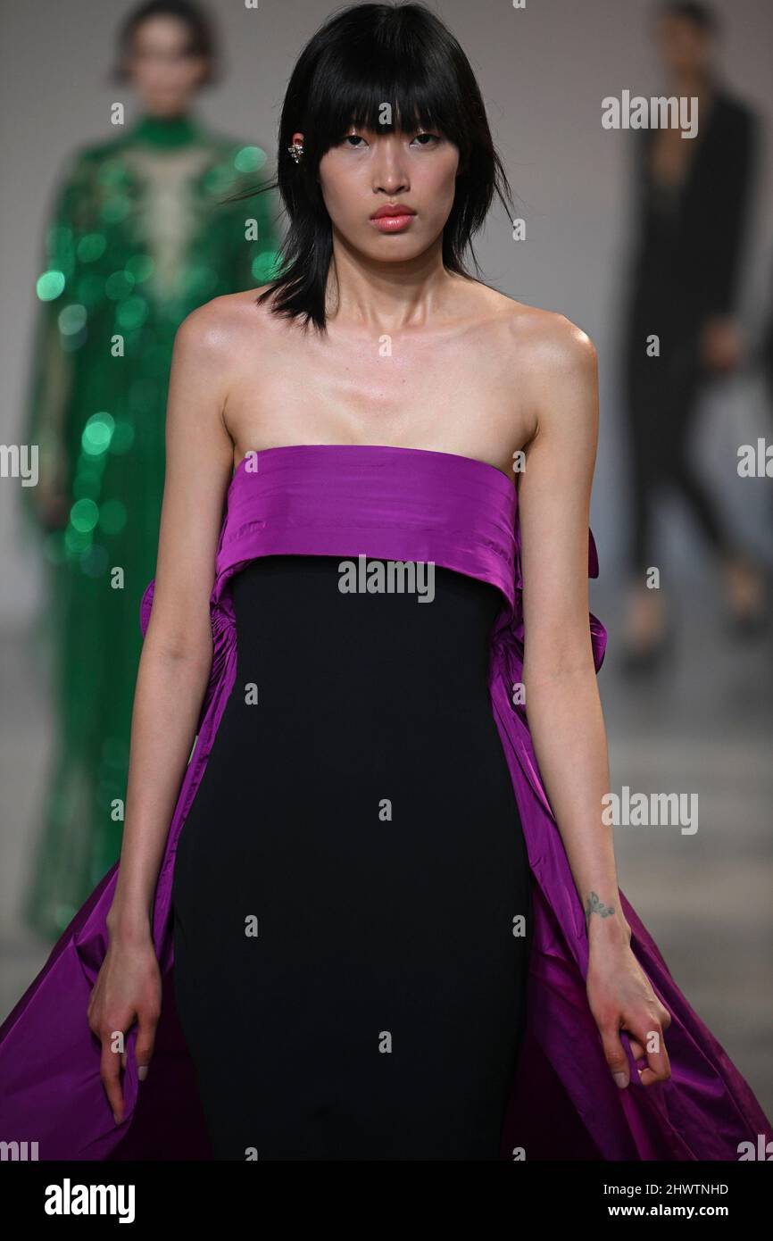 Model Dahan walks on the runway at the Elie Saab fashion show during ...