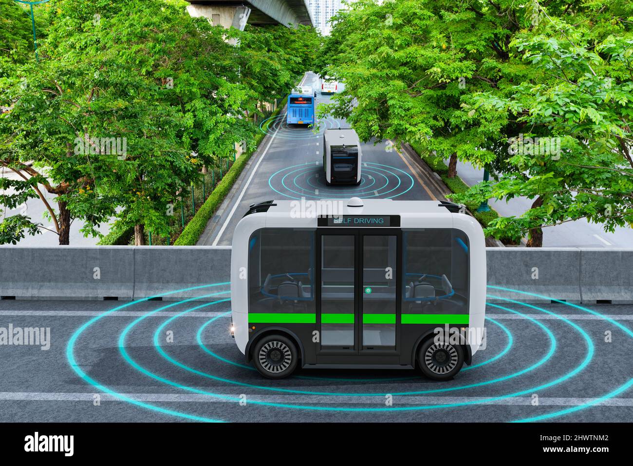 Autonomous electric shuttle bus self driving across city green road ...