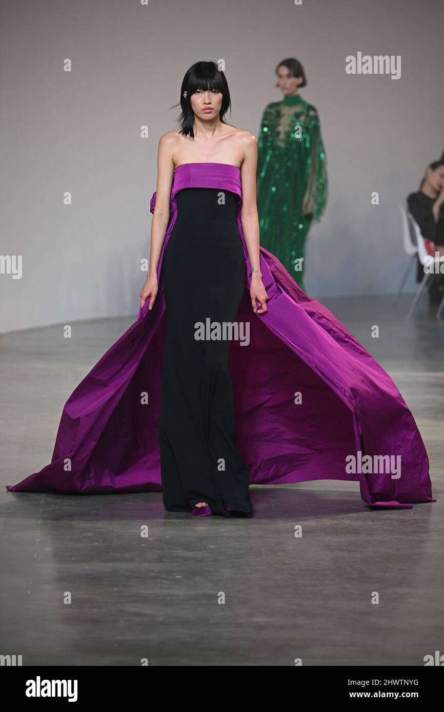 Model Dahan walks on the runway at the Elie Saab fashion show during ...