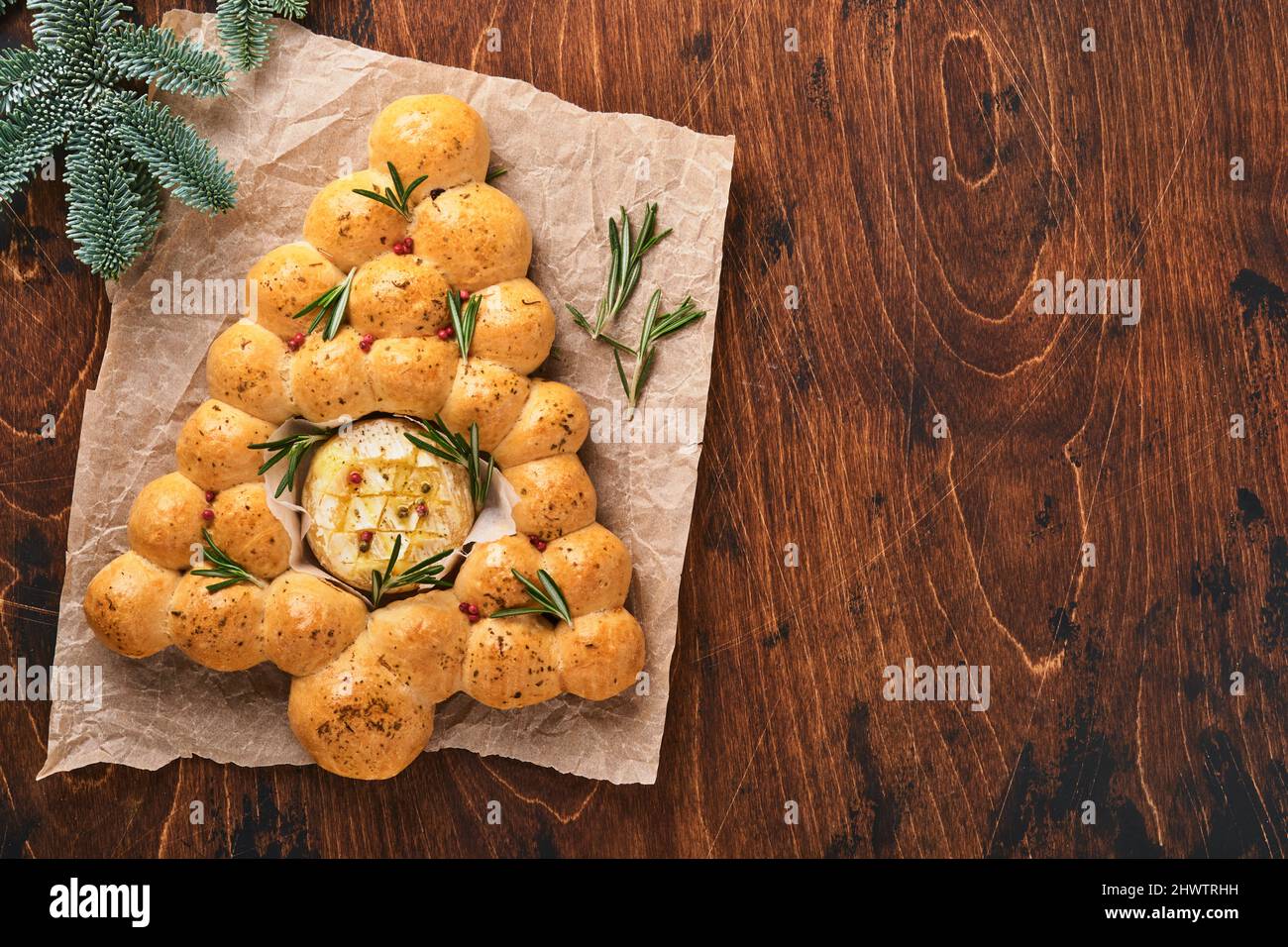 Bread buns Christmas tree with Roasted camembert cheese and rosemary on ...