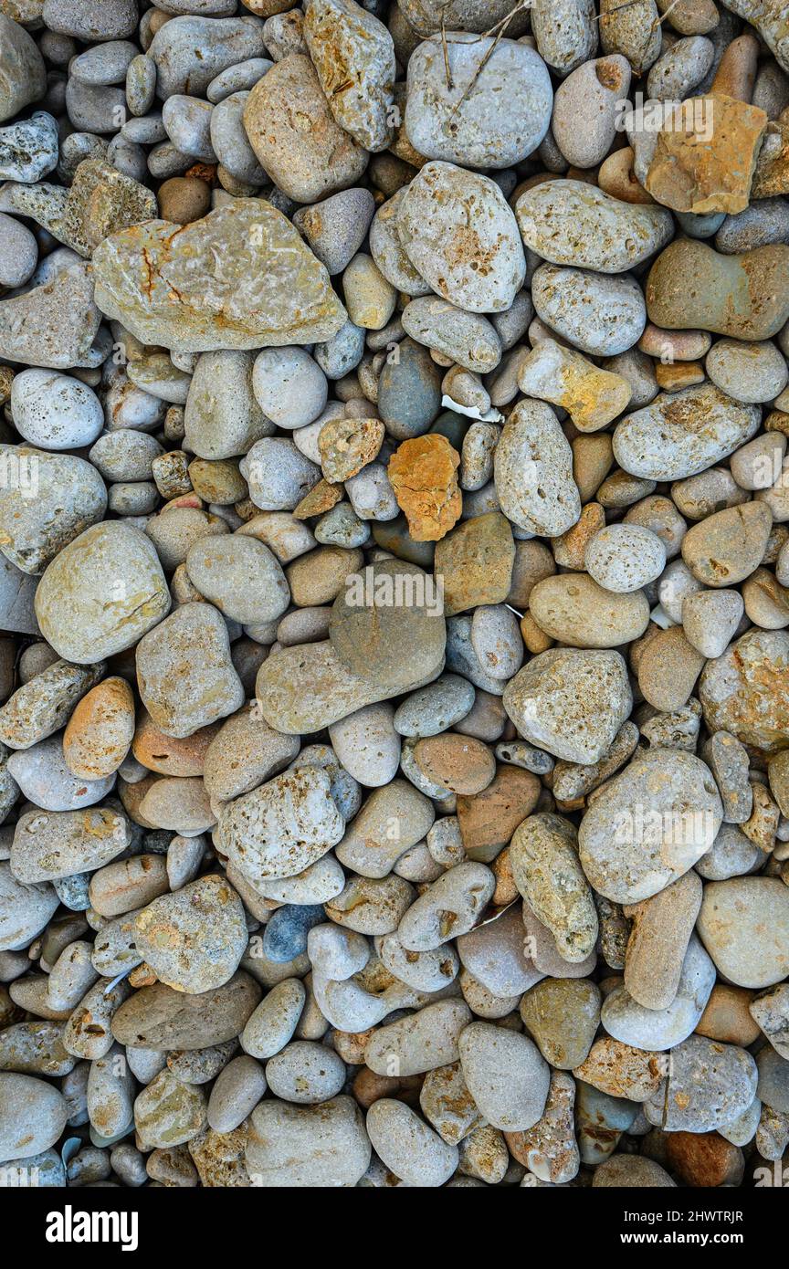 Rubble beach top view. Rock ocean pattern. Multicolor rocky on ocean ...