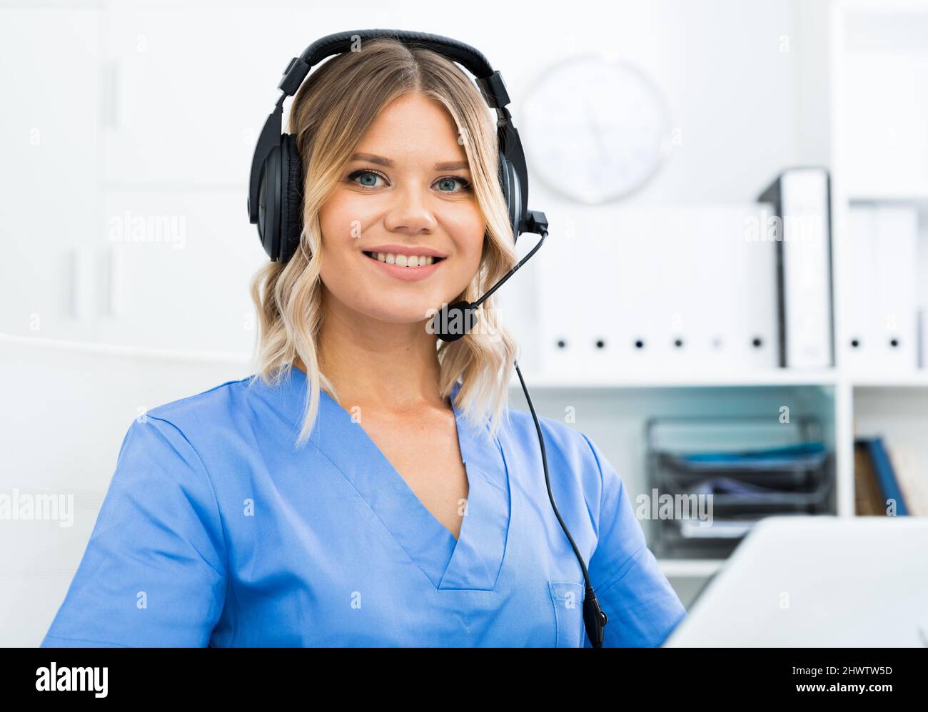 Ready to help specialist medical call center in headphones with ...