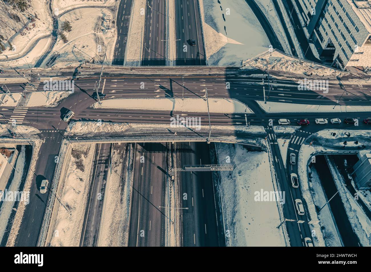 Aerial view of the highway and intersection in the city on a winter day ...