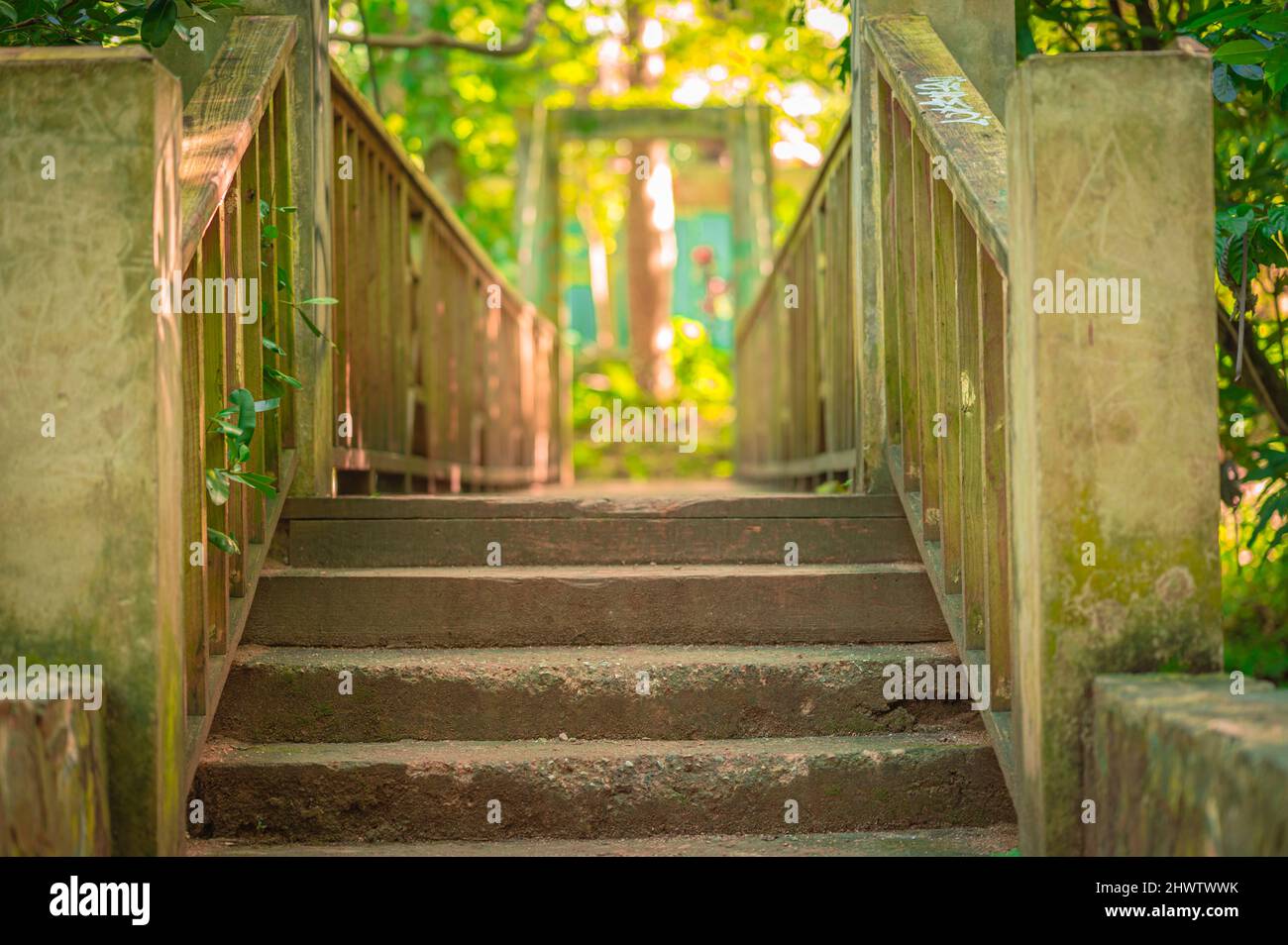 Tourist bridge with wooden railings. Stone bridge construction ...