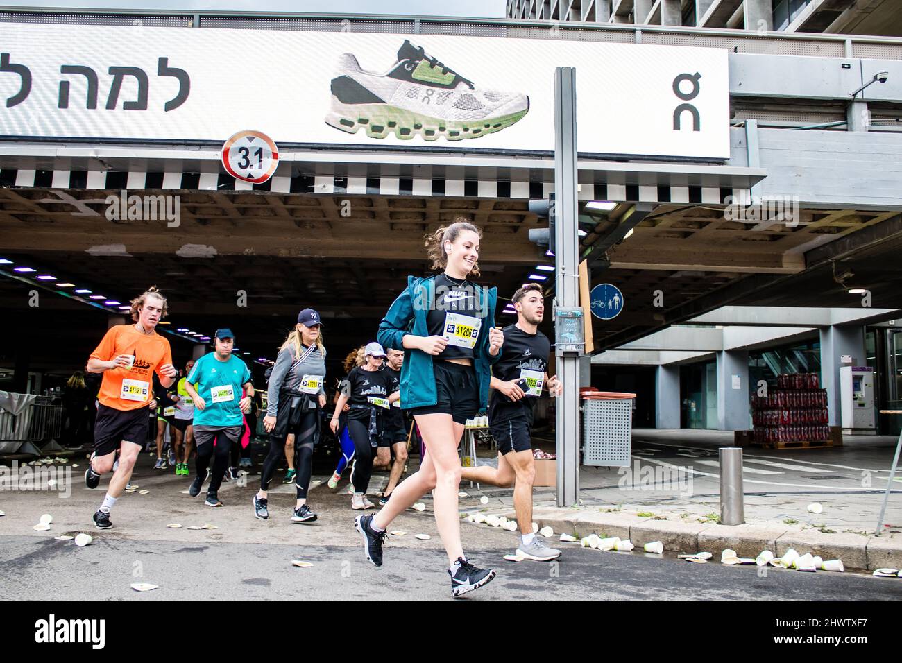 Tel Aviv, Israel - February 25, 2022 Runners in the street of Tel Aviv ...