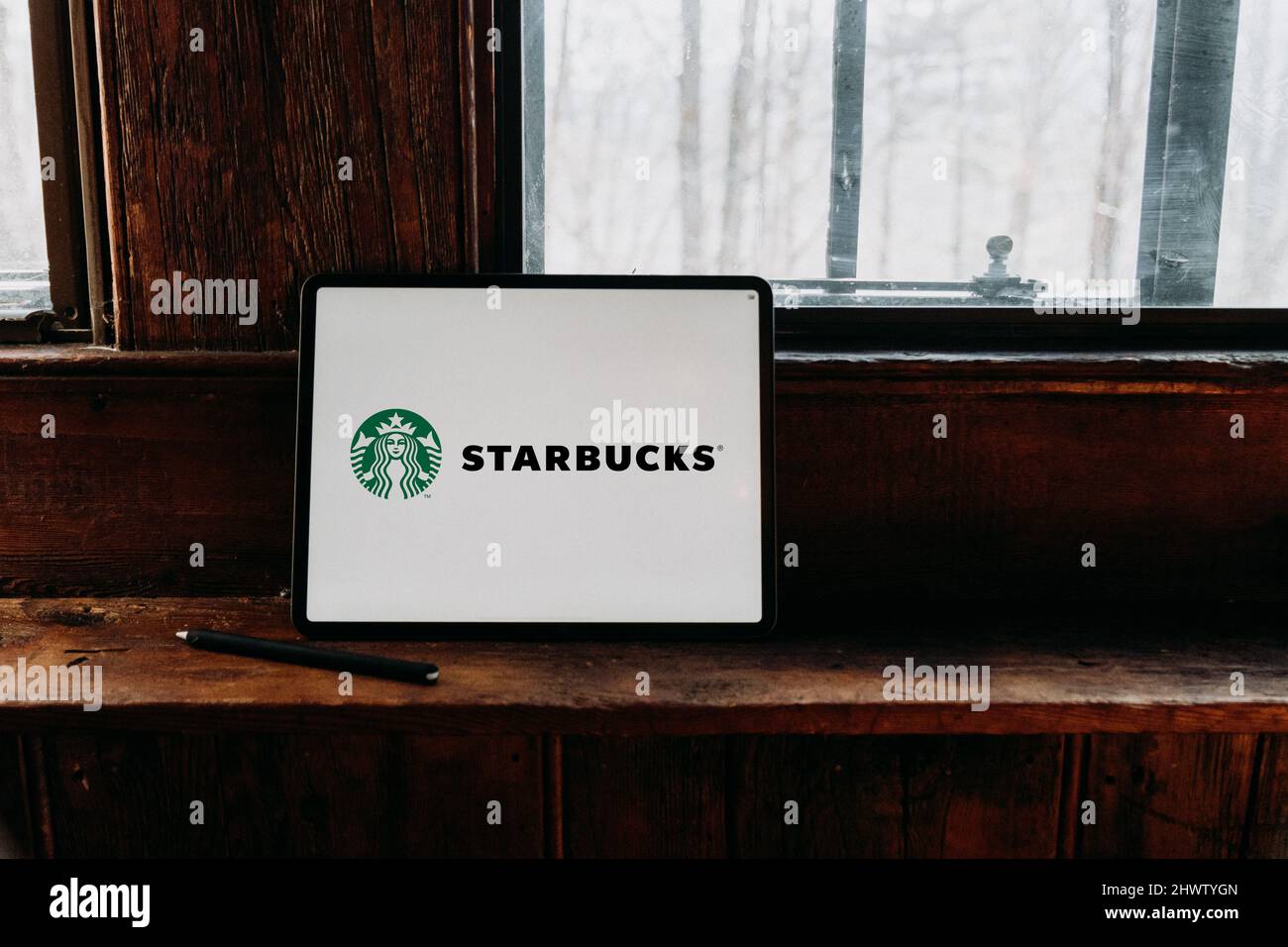Starbucks logo on tablet screen Stock Photo - Alamy