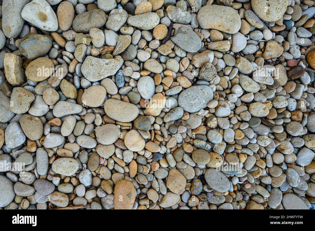 Smoothness ocean pebbles top view. Sea slag pattern. Masonry smoothness ...