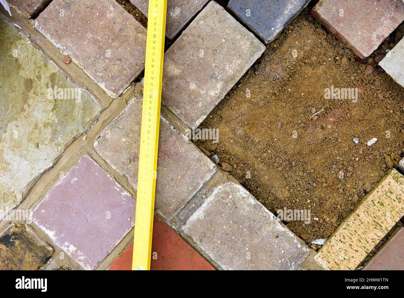 Laying a patio with stone concrete and tools of the trade Stock Photo ...