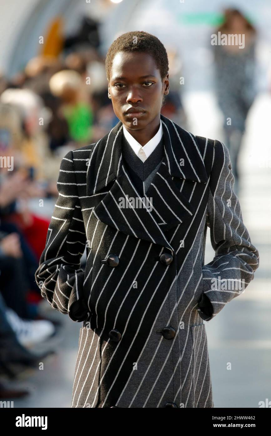 Model Awar Odhiang walks on the runway at the Stella McCartney fashion ...