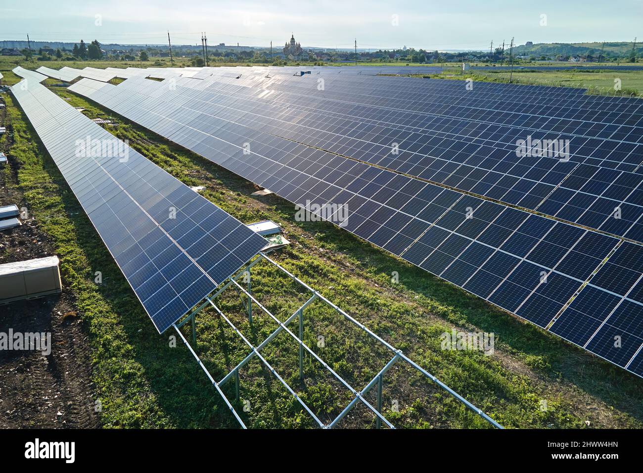 Aerial view of big electric power plant under construction with many ...