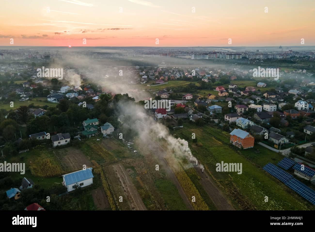 Aerial view of agricultural waste bonfires from dry grass and straw ...